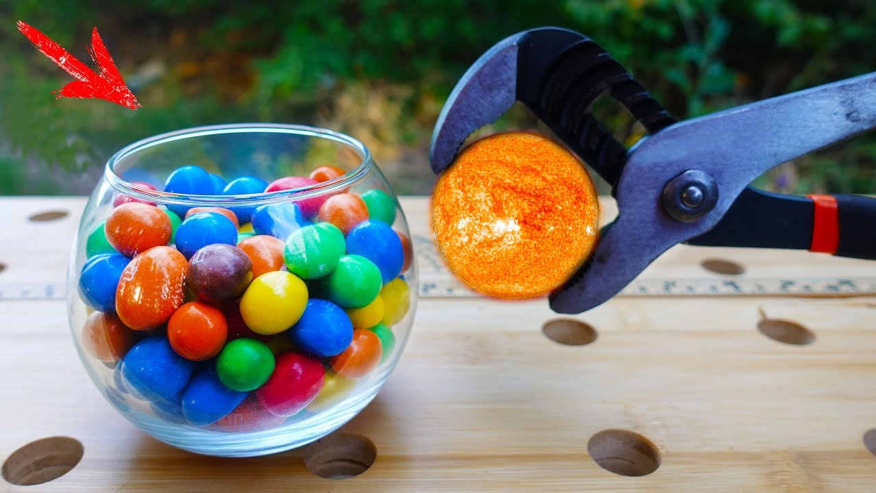 EXPERIMENT: Glowing 1000 degree METAL BALL vs M&M